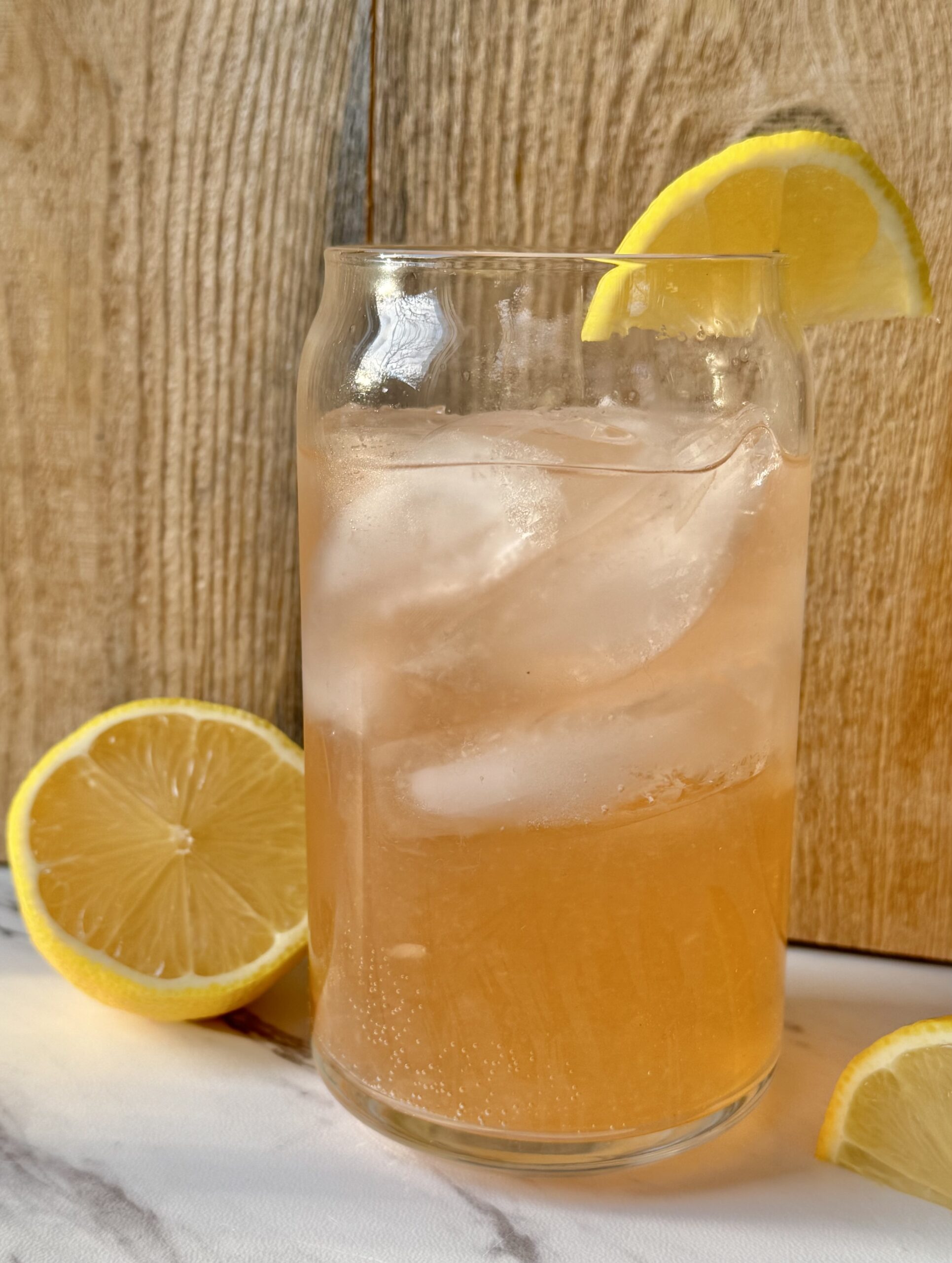 Sparkling Water Mocktail with Lemon and Bitters - Land of 10,000 Cocktails
